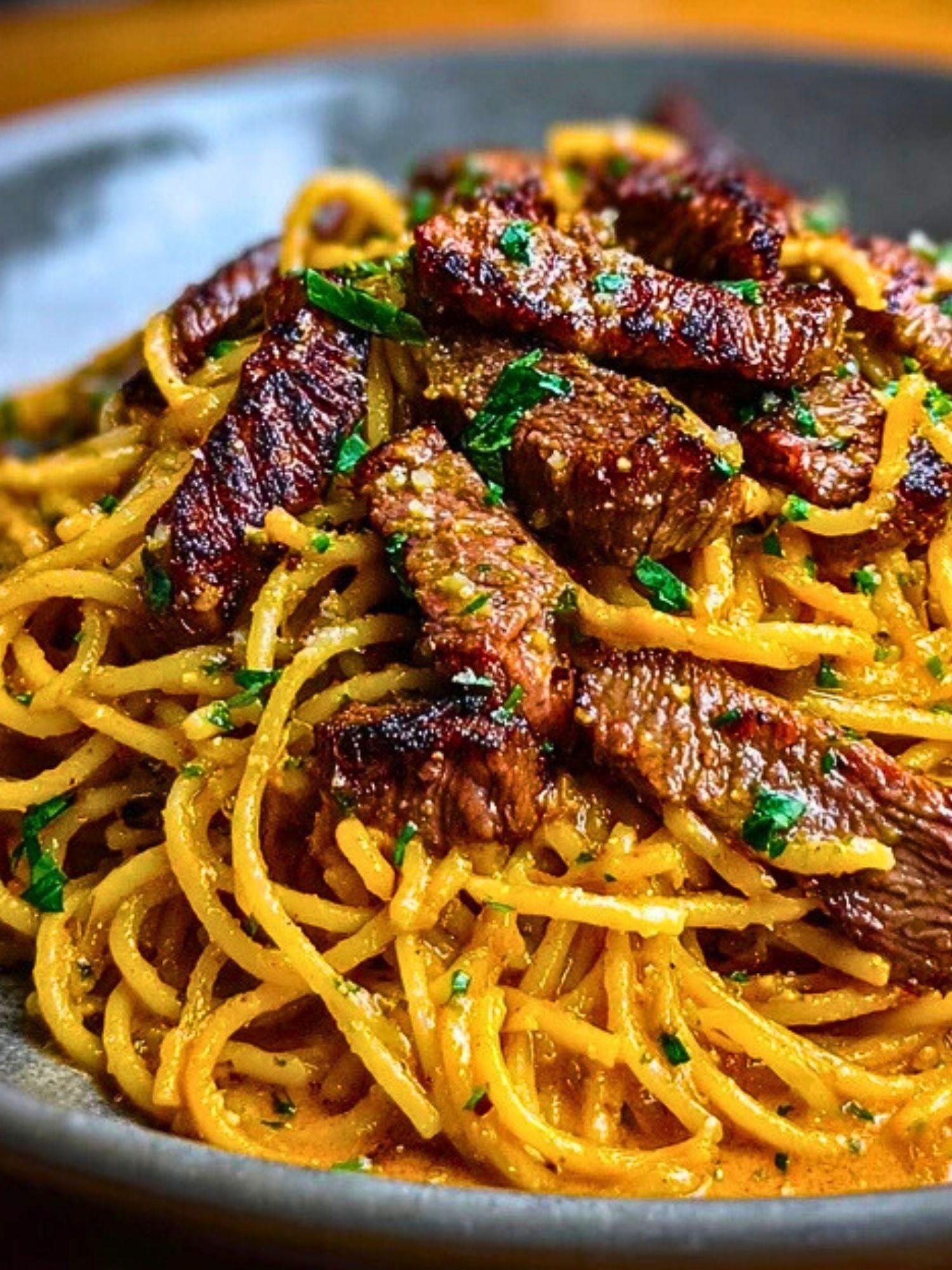 Creamy Cajun Garlic Butter Spaghetti with Beef Strips
